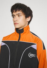 Night Addict Hardshelljacke - black/orange/schwarz - Zalando.de