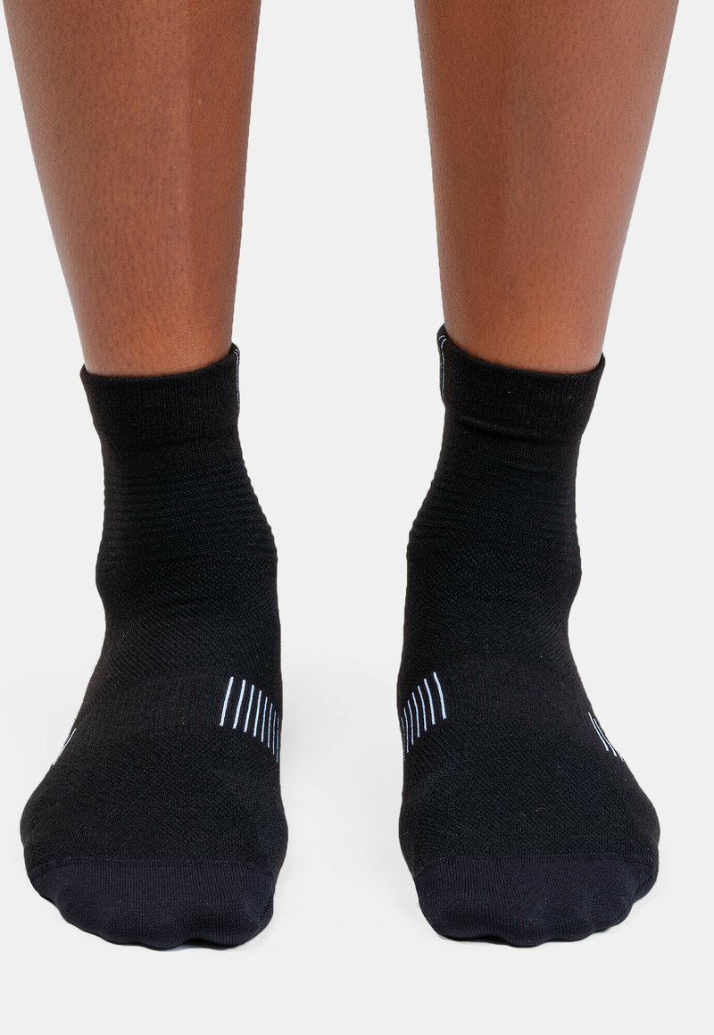 On ULTRALIGHT MID - SPORTS SOCKS - Sports socks - black white/black ...