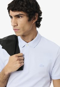 Lacoste Polo shirt - bleu clair -jg/mottled light blue - Zalando