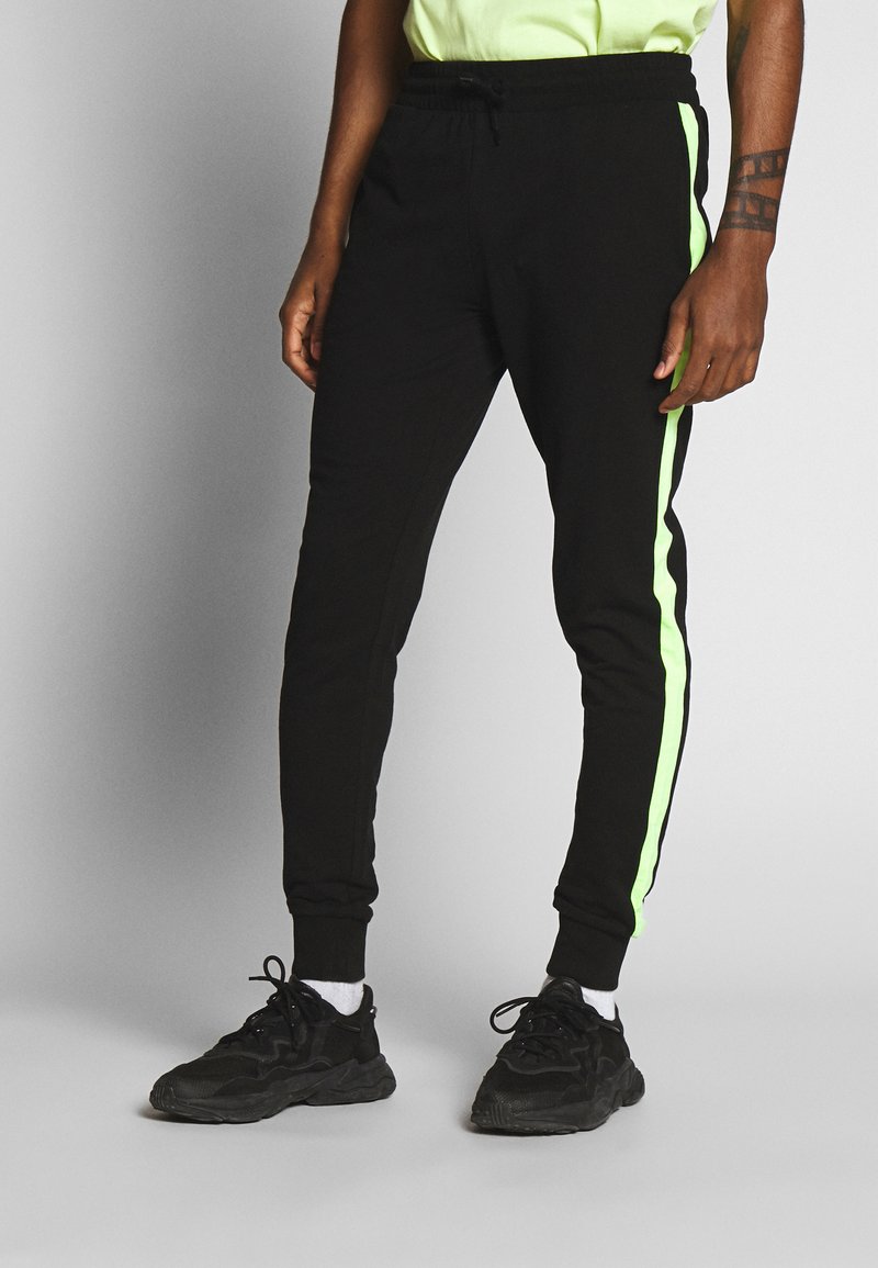 Urban Classics NEON STRIPED SWEATPANTS - Trainingsbroek - black ...