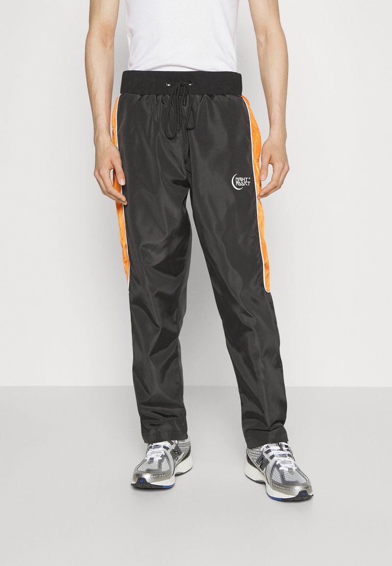 Night Addict NAMOON UNISEX - Pantaloni sportivi - black/orange/nero ...