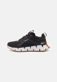 Reebok ZIG DYNAMICA - Scarpe da corsa su strada - core black/footwear ...