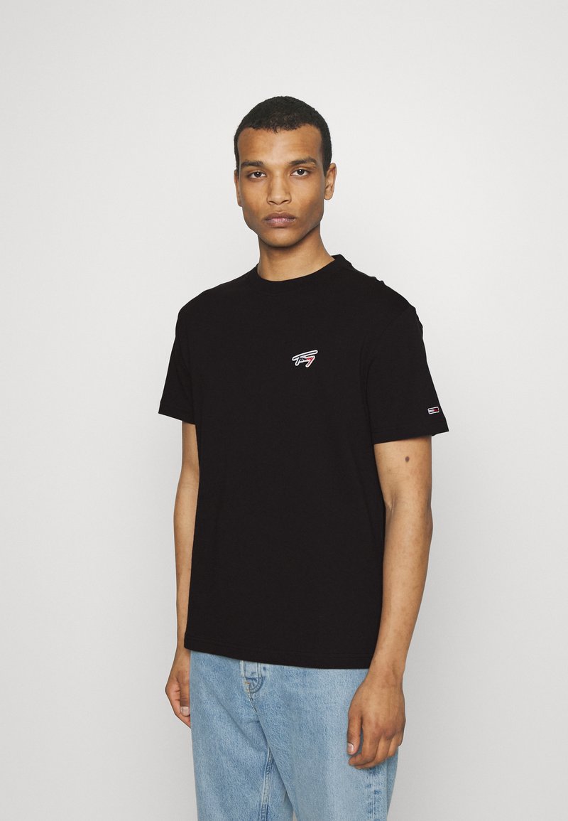 Tommy Jeans SIGNATURE TEE UNISEX - Print T-shirt - black - Zalando.co.uk