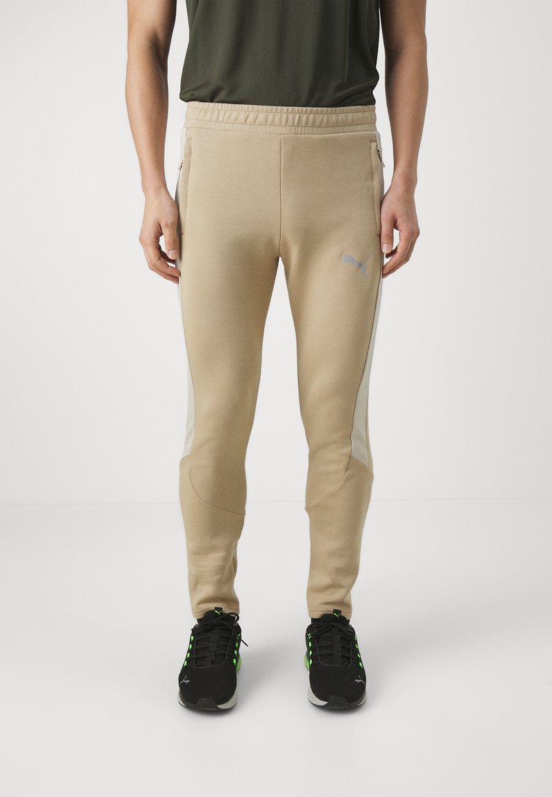 Puma EVOSTRIPE - Pantalon de survêtement - prairie tan/marron clair - ZALANDO.FR