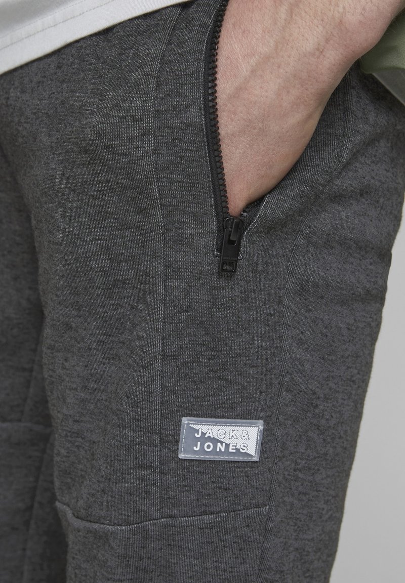 Jack & Jones Tracksuit bottoms - dark grey melange/dark grey - Zalando ...