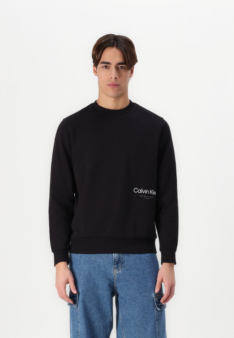 Calvin Klein OFF PLACEMENT LOGO - Pusa - black/must - Zalando.ee
