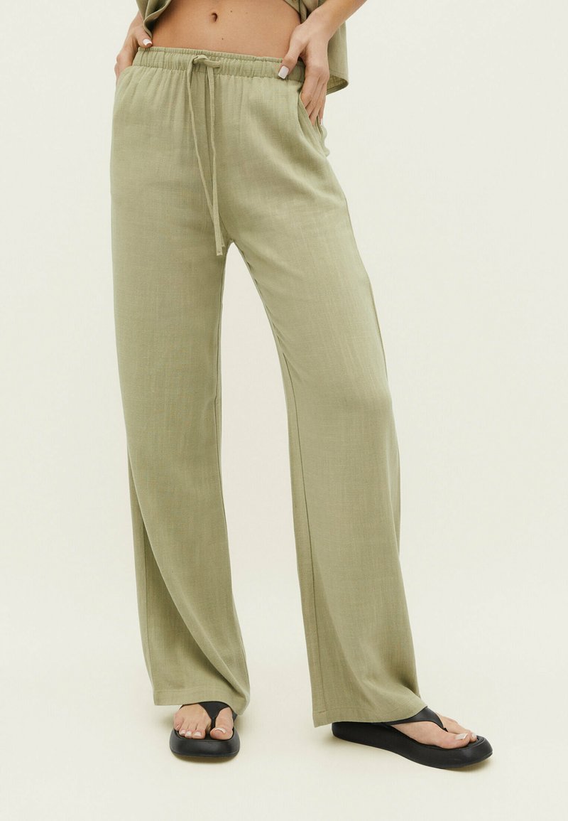 Stradivarius FLOWING - Spodnie materiałowe - Zalando.pl