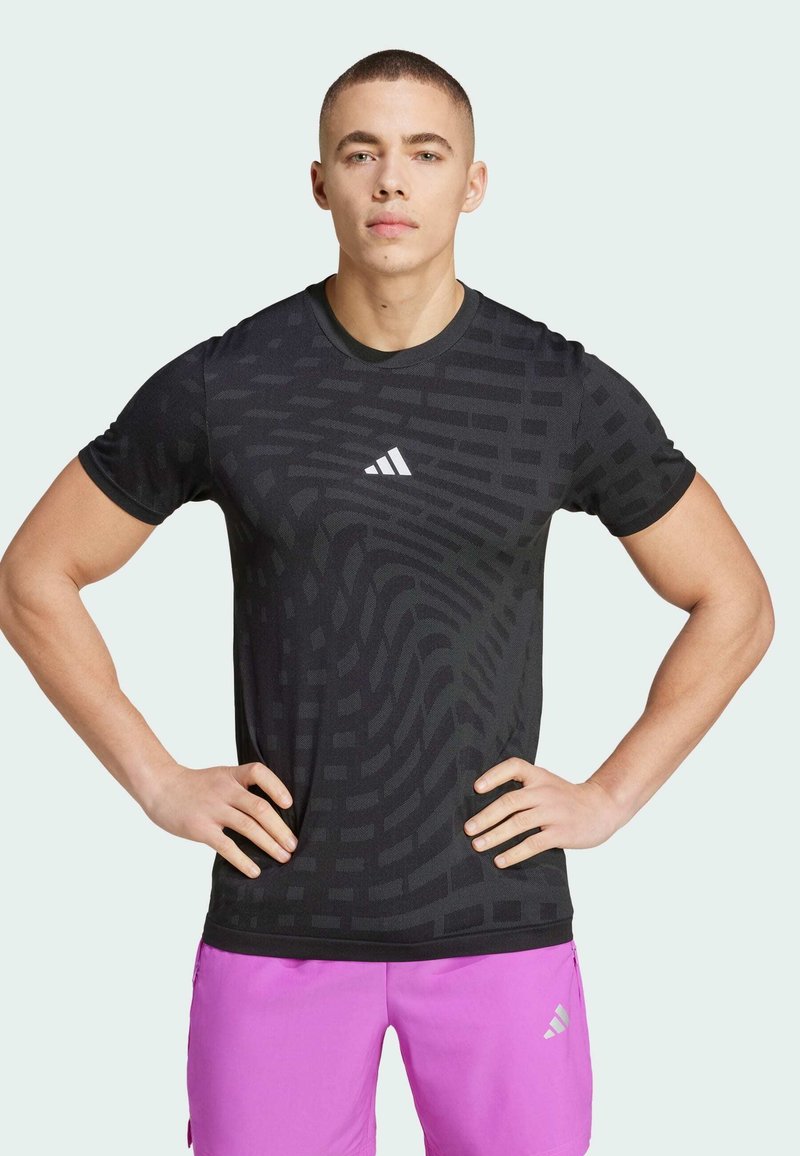 adidas Performance GYM SEAMLESS - Print T-shirt - black grey six/black ...