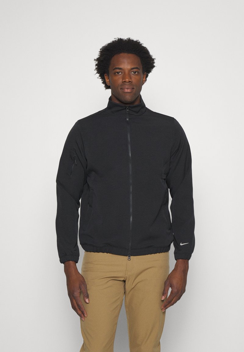 Nike Golf THERMAFIT UNSCRIPTED JACKET - Hardshell jacket - black/white ...