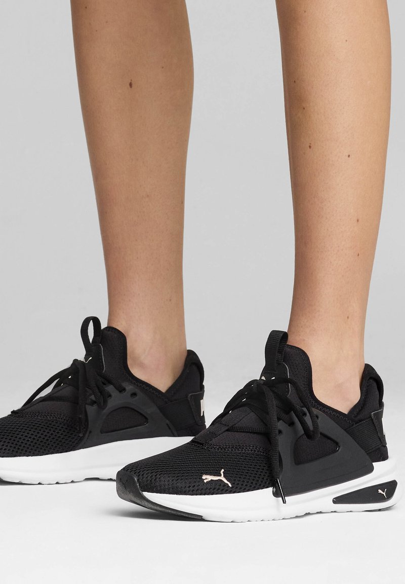 Puma SOFTRIDE ENZO - Road running shoes - black island pink/black ...