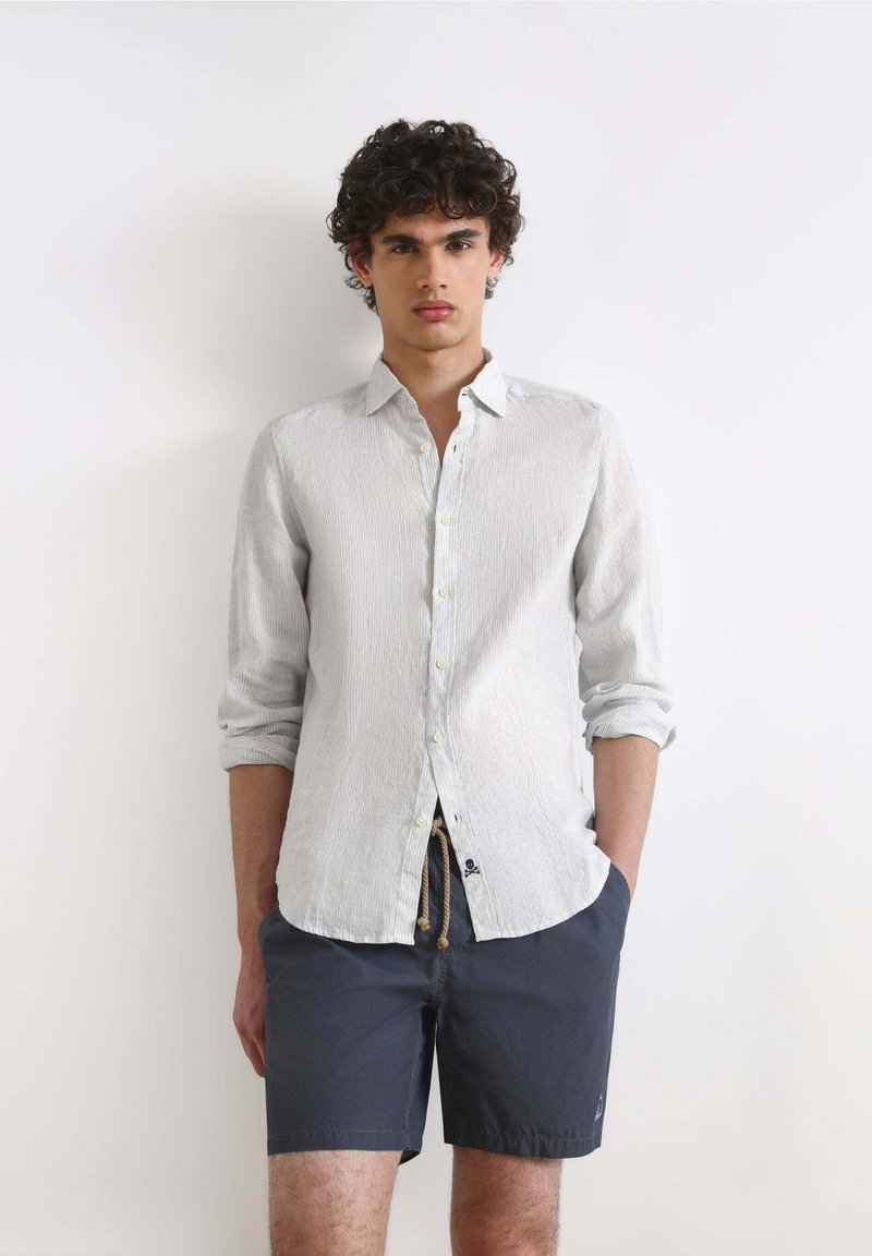 Scalpers WITH EMBROIDERED SKULL FADED - Swimming shorts - navy/dark ...