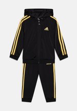 adidas Performance SHINY UNISEX SET - Treningas - black/gold metallic ...