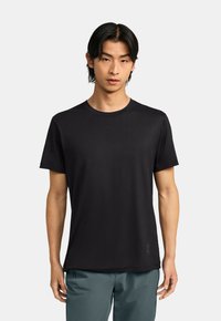 On MOVEMENT-T - Basic T-shirt - black - Zalando