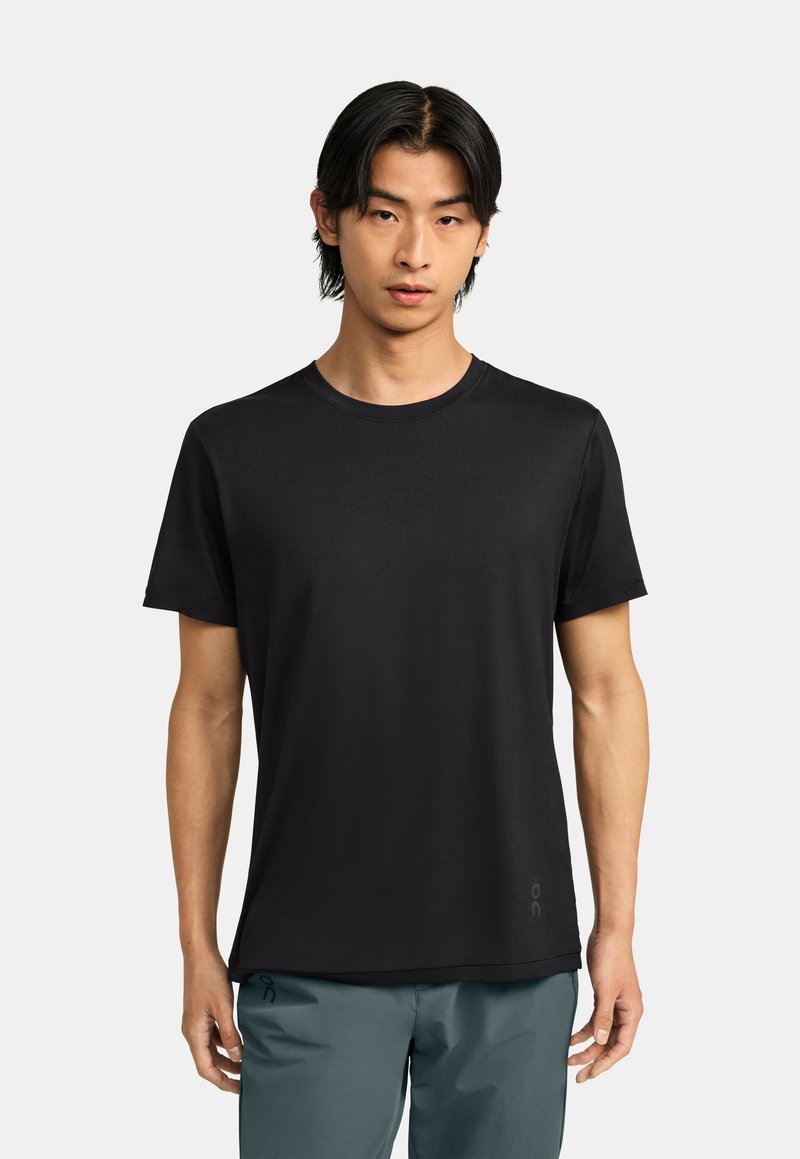 On MOVEMENT-T - Basic T-shirt - black - Zalando.ie