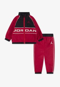 Jordan JORDAN WIND BREAKER PIPING UNISEX SET - Trainingsbroek - gym red ...