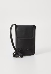 Calvin Klein Jeans PHONE BAG UNISEX - Pochette pour téléphone - black ...