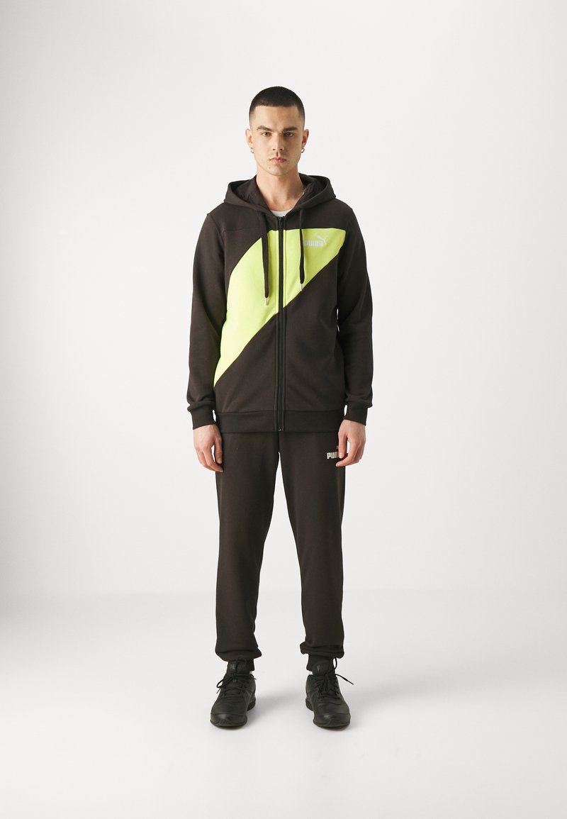 Puma POWER TRACKSUIT - Tuta - black/lime sheen/nero - Zalando.it