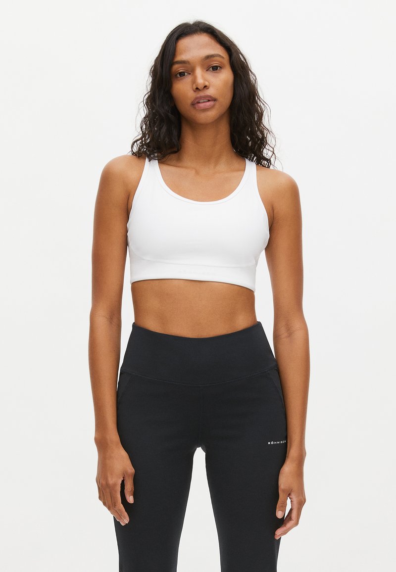 Röhnisch FLATTERING - Medium support sports bra - white - Zalando
