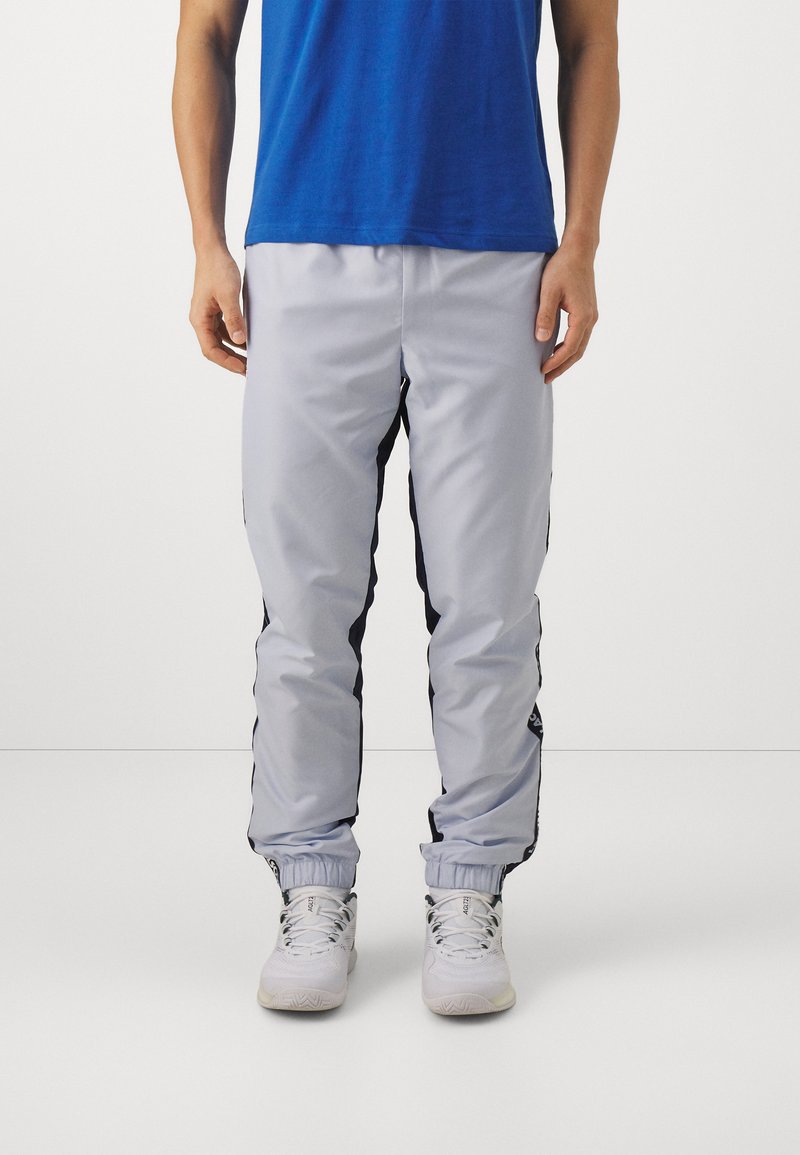 Lacoste Sport TROUSERS TC - Teplákové kalhoty - phoenix blue/navy blue ...