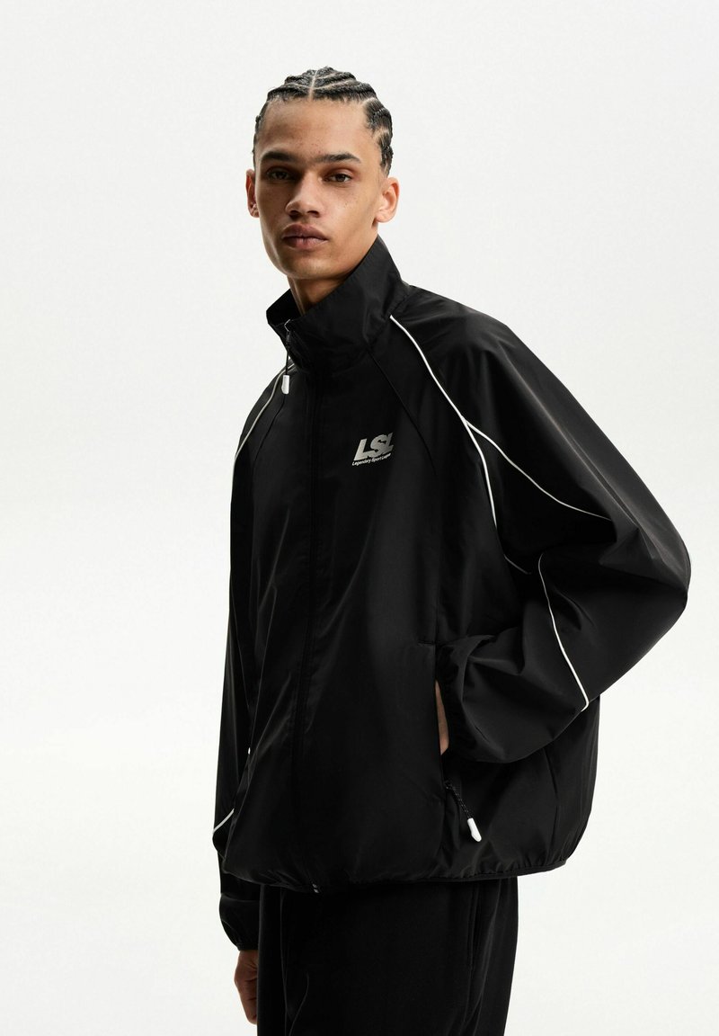 Bershka TECHNICAL - Giacca da mezza stagione - black/nero - Zalando.it