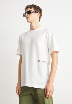 Calvin Klein Jeans PREMIUM MONOLOGO TEE - T-Shirt print - bright white/weiß - Zalando.de