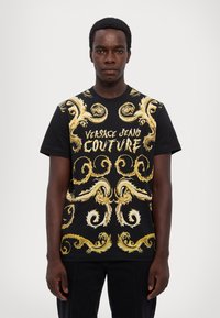 Versace Jeans Couture Nyomott mintás póló - black/gold/fekete - Zalando.hu