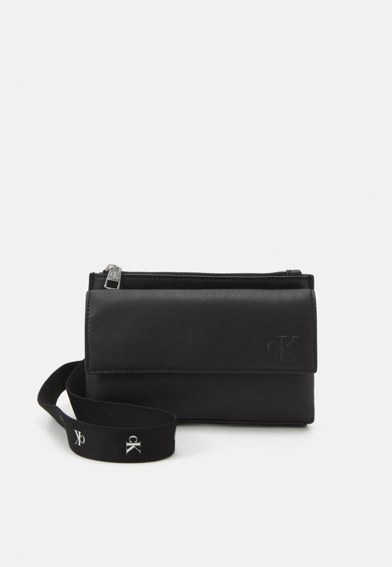 Calvin Klein Jeans ULTRALIGHT PHONE CROSSBODY - Phone case - black ...