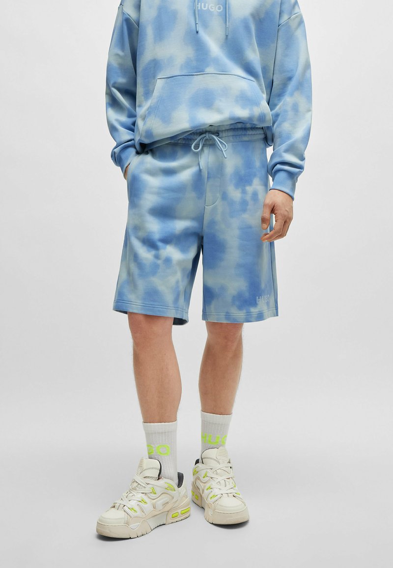 HUGO Tracksuit bottoms - open blue twentyfive/blue - Zalando.ie