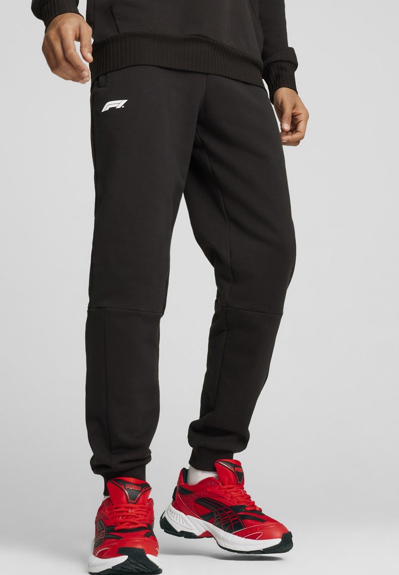 Puma F1® - Tracksuit bottoms - black - Zalando