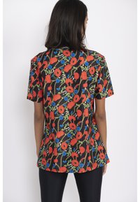 Flavia Valentini T-Shirt print - black/dunkelbraun - Zalando.de