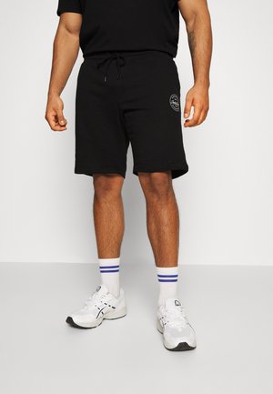 Tapout NORMALE PASSFORM LIFESTYLE BASIC - Jogginghose - black white/schwarz - Zalando.de