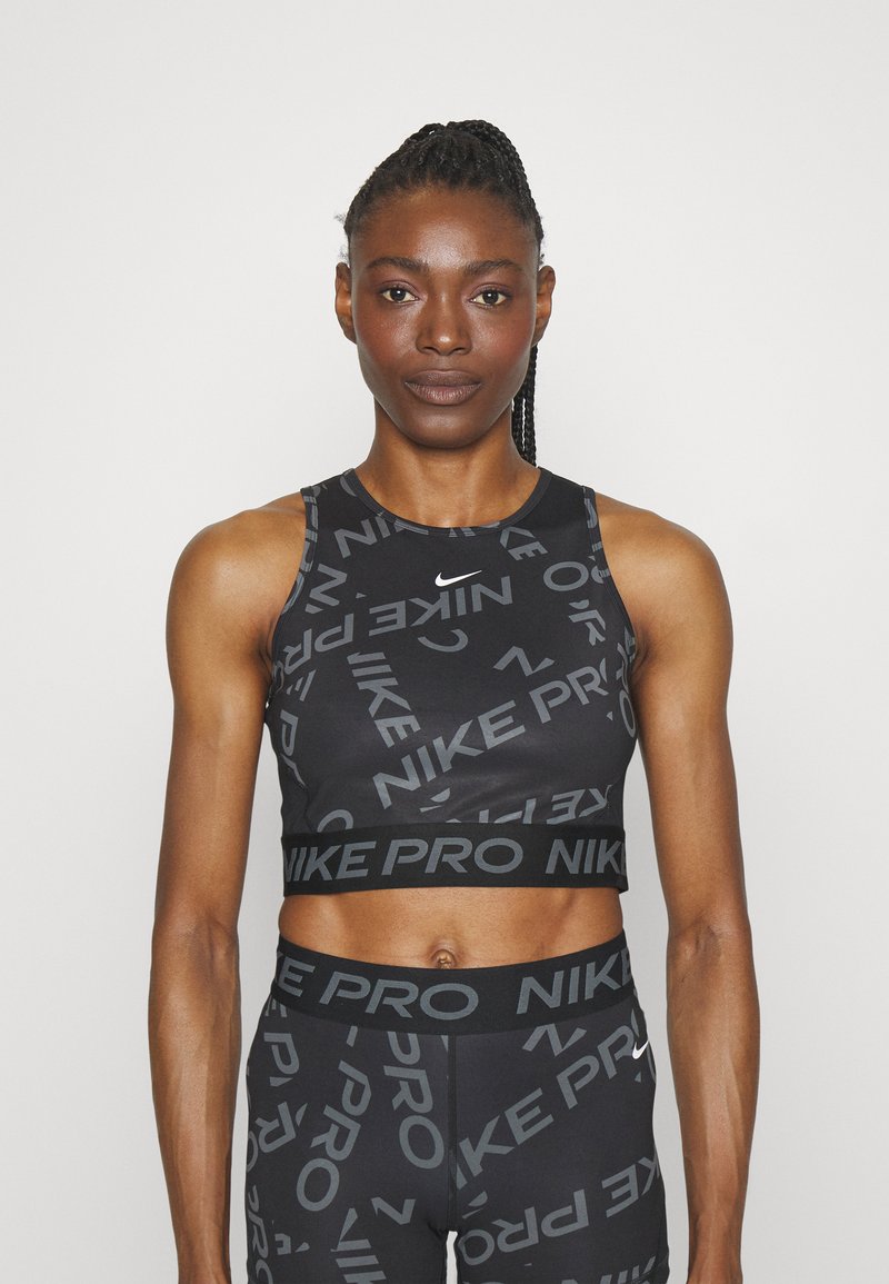 Nike Performance CROP TANK - Top - black - Zalando.co.uk