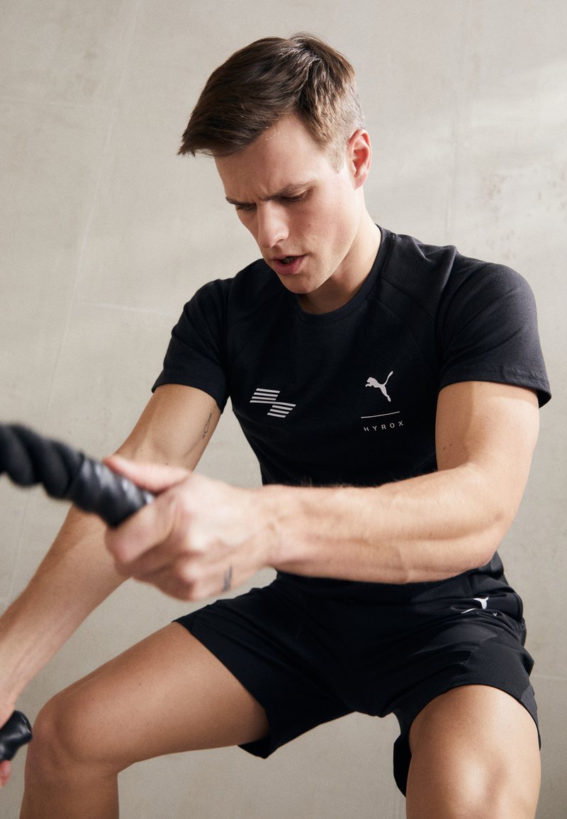 Puma HYROX FIT ULTRABREATHE TRIBLEND TEE - Sports T-shirt - black ...