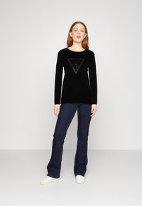 Guess LS RN DIANE TRIANGLE LOGO SWTR - Trui - jet black/zwart - Zalando.nl