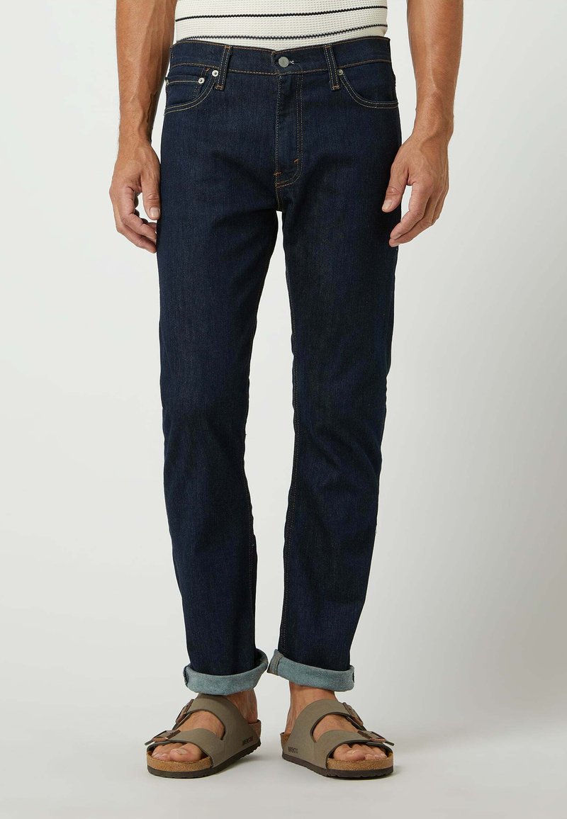 Levi's® MIT STRETCH-ANTEIL MODELL - Slim fit jeans - tree topper adv ...
