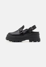 Buffalo ASPHA - Clogs - black - Zalando.de