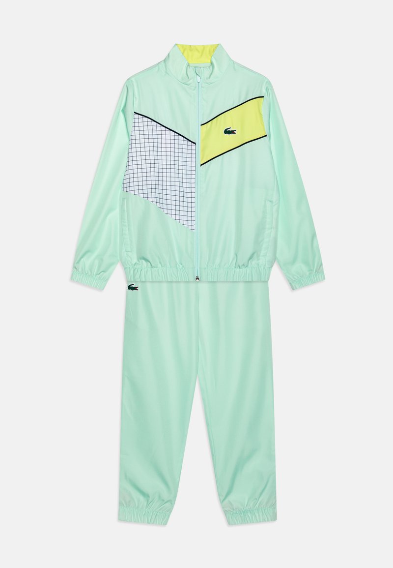 Lacoste SPORTS TRACKSUIT UNISEX SET - Tracksuit - arielle green/white ...