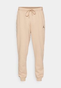 Jordan Tracksuit bottoms - legend md brown/sail/beige - Zalando.ie
