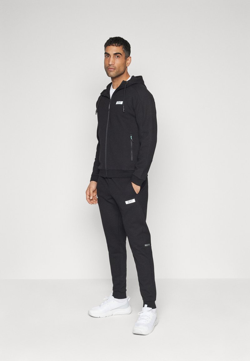 EA7 Emporio Armani NATURAL VENTUS HOODIE - Tracksuit - black - Zalando