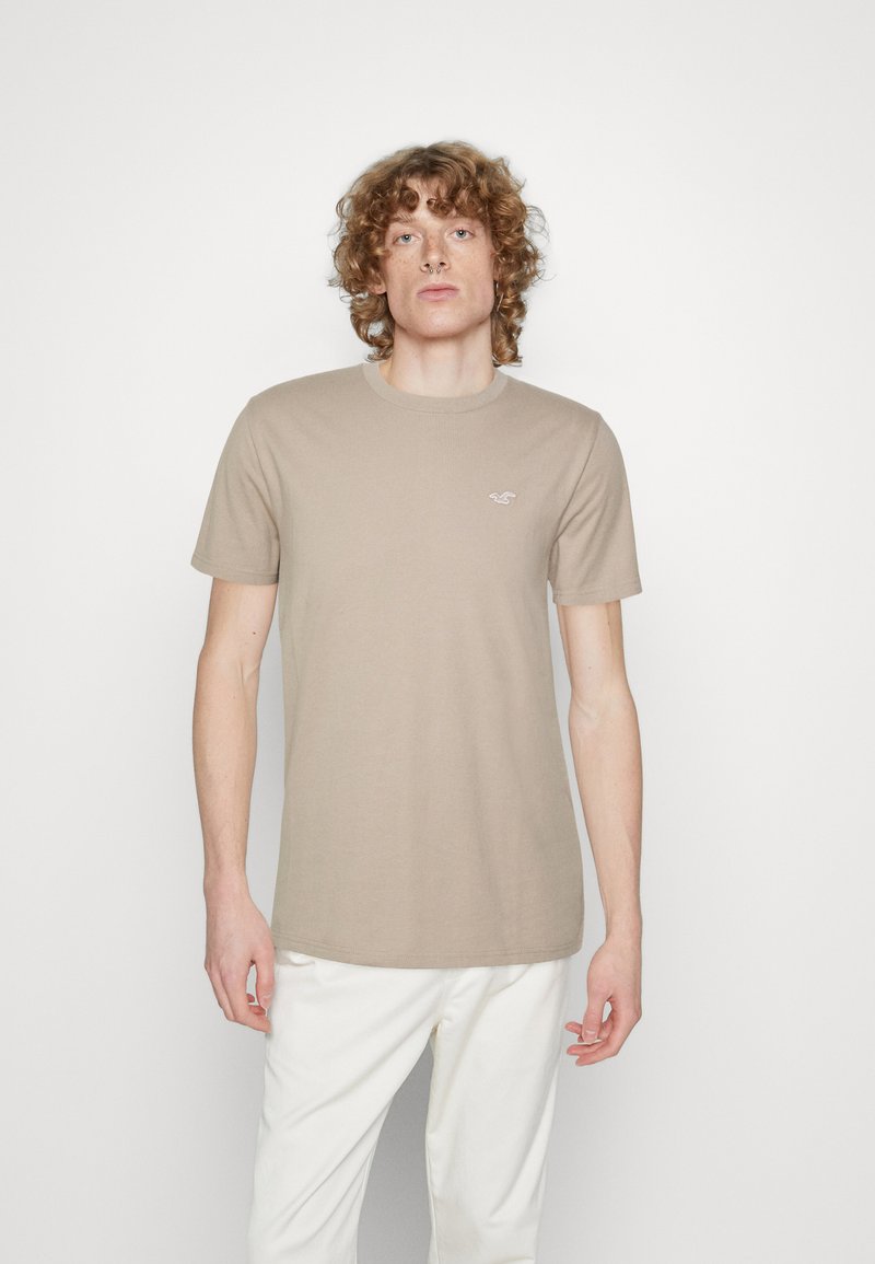 Hollister Co. CREW ICON SOLIDS TREND UPDATE - Basic T-shirt - tan/sand ...