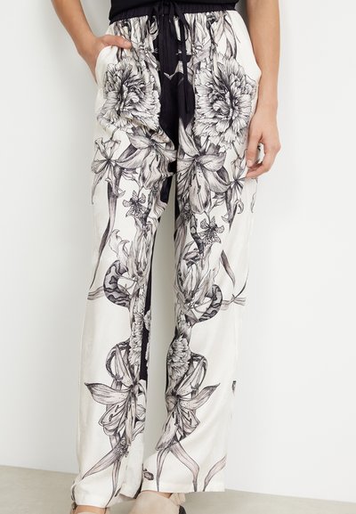 adidas Originals ALLOVER ZEBRA - Jogginghose - cloud white/black ...