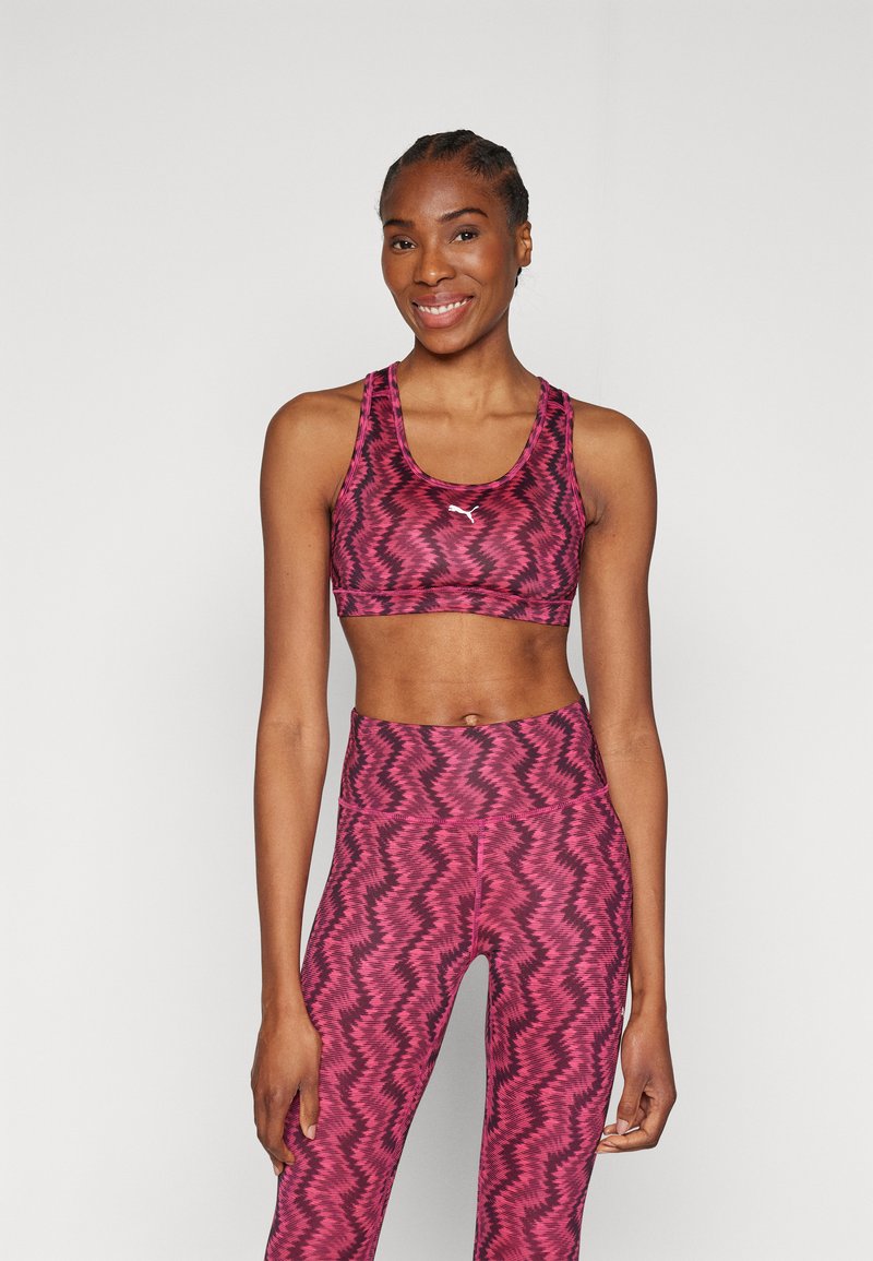 Puma Sport-BH mit mittlerer Stützkraft - garnet rose/pink - Zalando.de