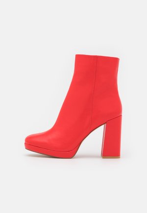 Botines rojos de mujer | online en Zalando