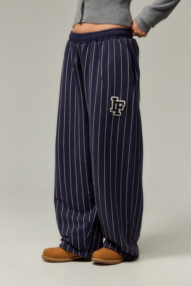 iets frans... HARRI PINSTRIPE UNISEX - Tracksuit bottoms - navy/dark ...