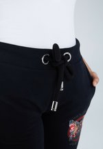 Jeremy Meeks WANDA - Tracksuit bottoms - schwarz/black - Zalando.de