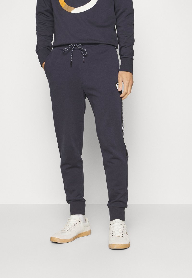 Michael Kors NEW EVERGREEN - Tracksuit bottoms - midnight/dark blue ...