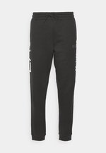 EA7 Emporio Armani TROUSER - Pantalon de survêtement - nero/noir - ZALANDO.CH