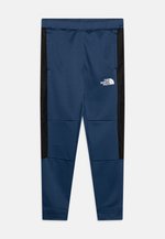 The North Face MOUNTAIN ATHLETICS - Tracksuit bottoms - shady blue/blue ...