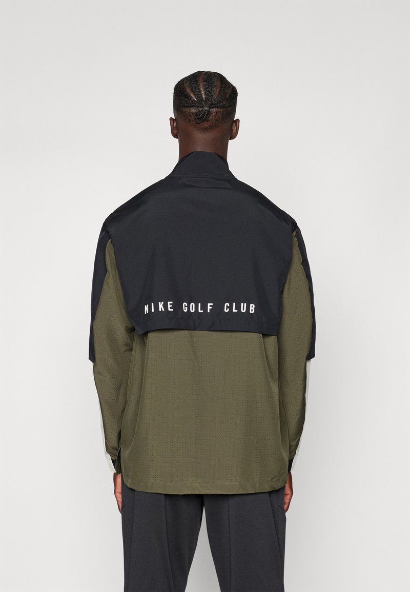Nike Golf CLUB JACKET HALFZIP - Giacca outdoor - black/cargo khaki ...