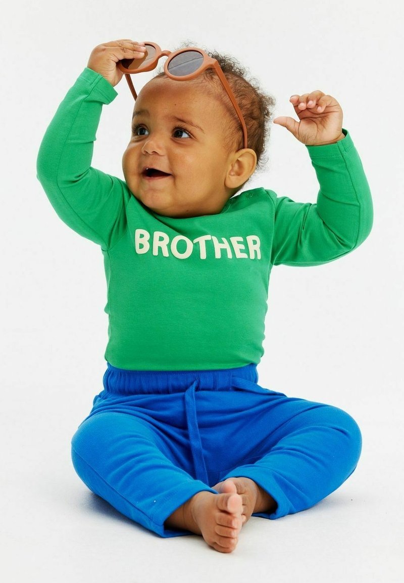 The New Siblings JYLAN - Tracksuit bottoms - strong blue/blue - Zalando.ie
